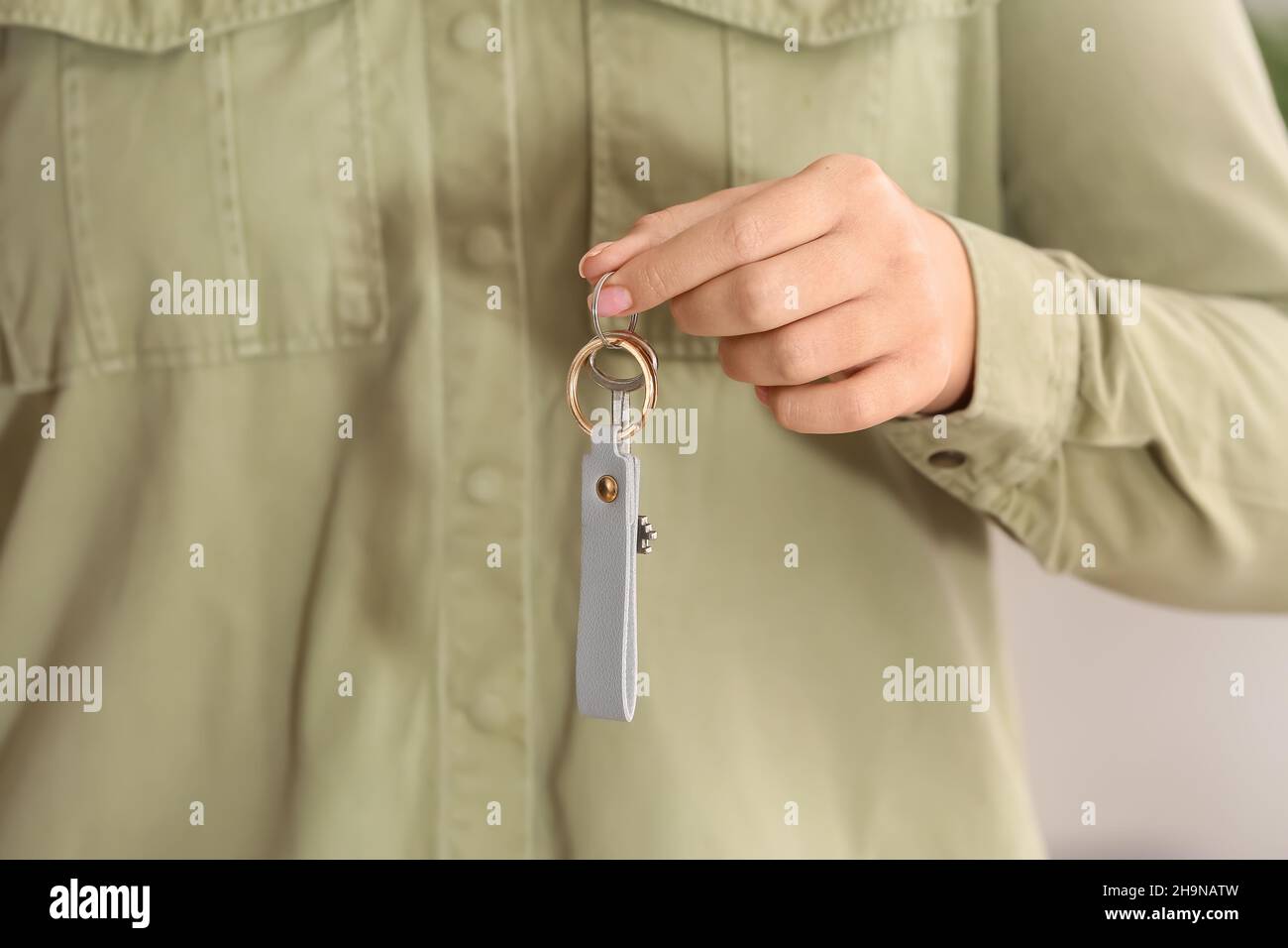 Woman door safety chain hi-res stock photography and images - Alamy