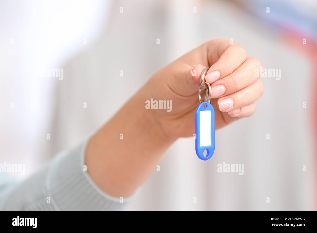 Female key holder hi-res stock photography and images - Alamy
