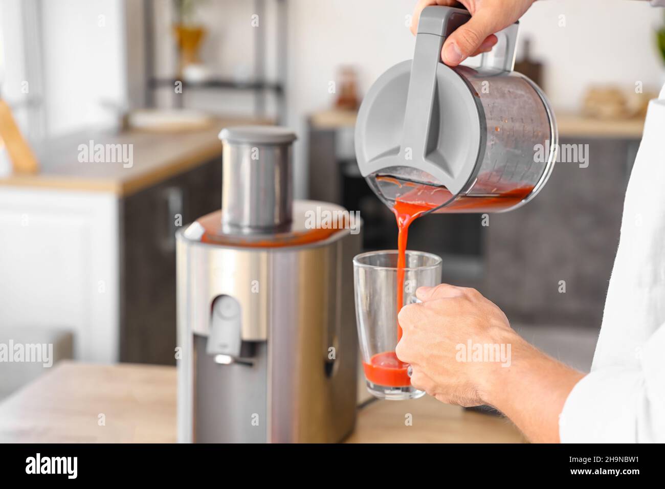 Handsome man pouring in preparing hi-res stock photography and images ...