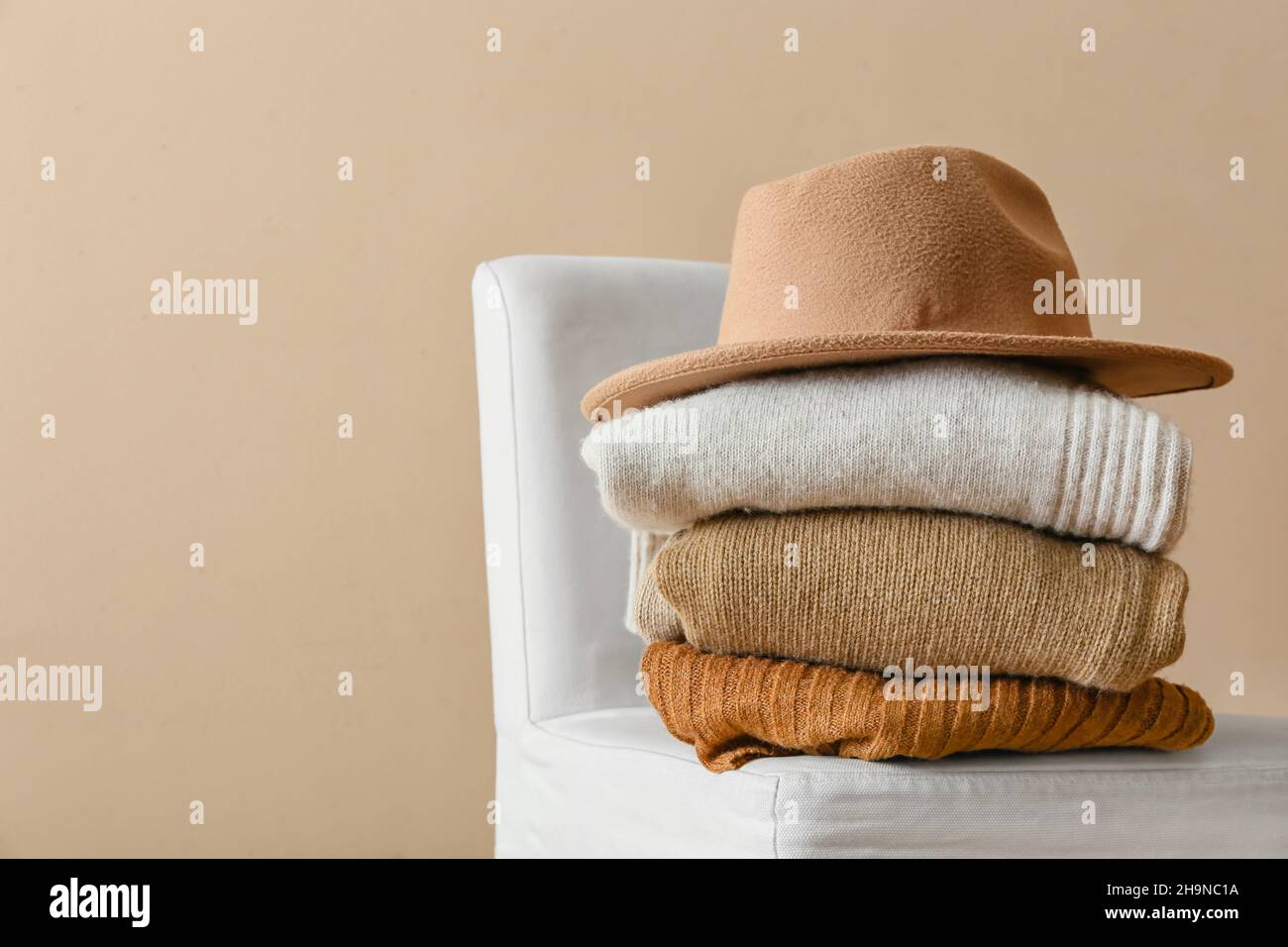 Chair stylish sweater hat hi-res stock photography and images - Alamy