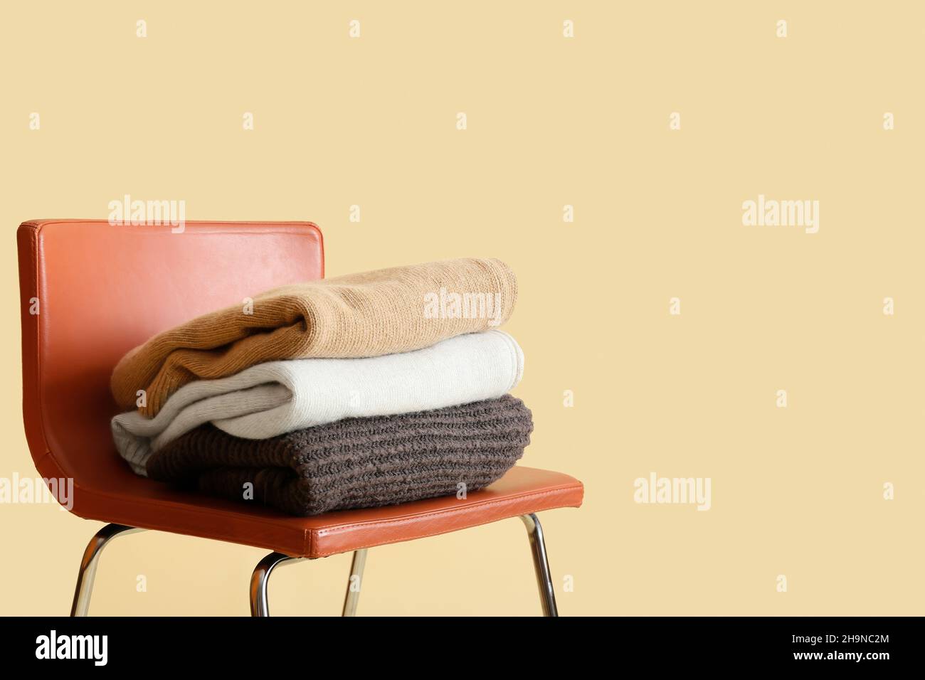 Stylish winter clothes chair hi-res stock photography and images - Alamy