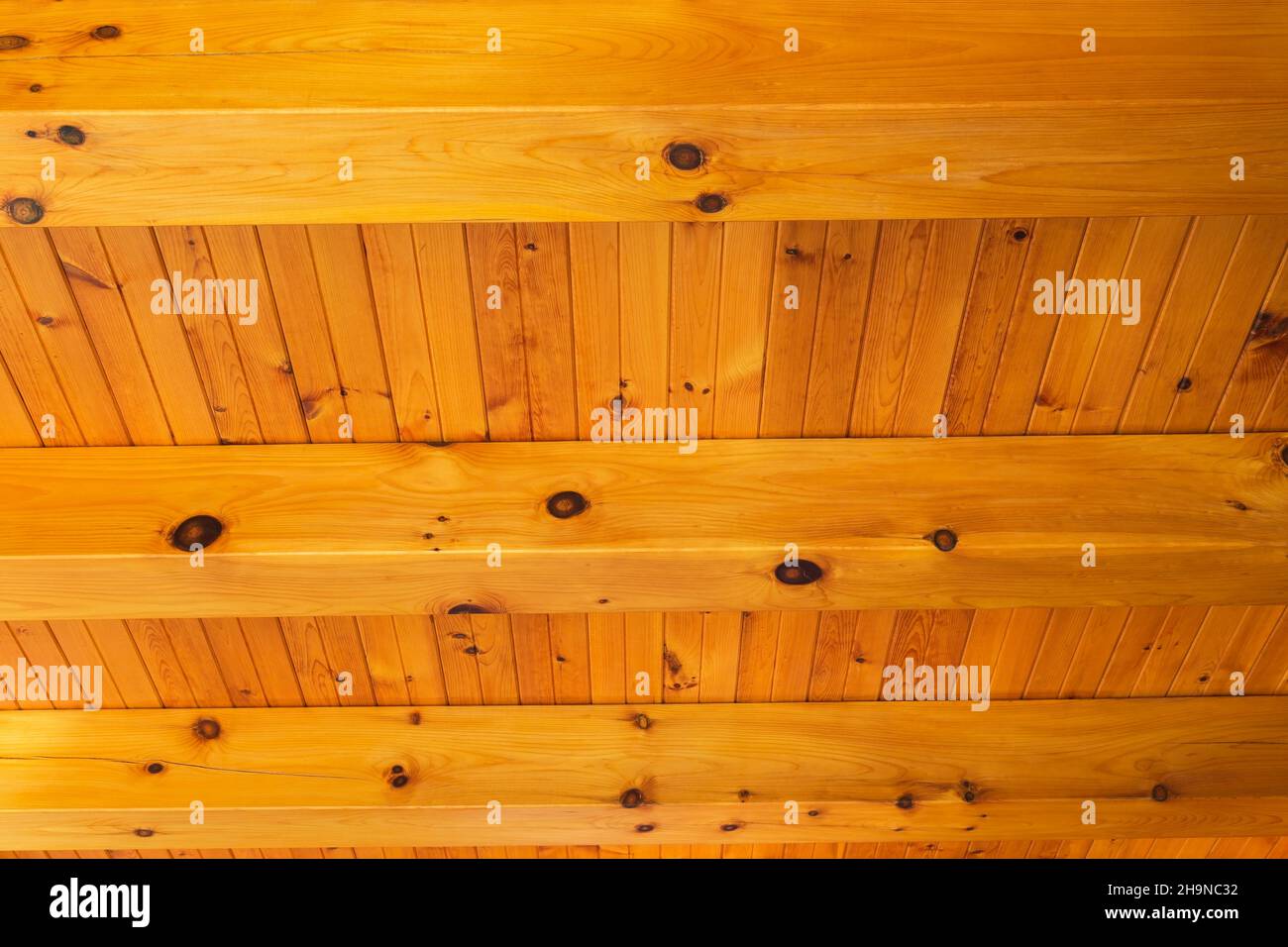 Ceiling made up of oiled Eastern white pine timber beams and narrow ...