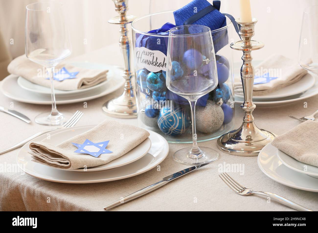 Beautiful table setting for Hanukkah celebration in dining room Stock ...