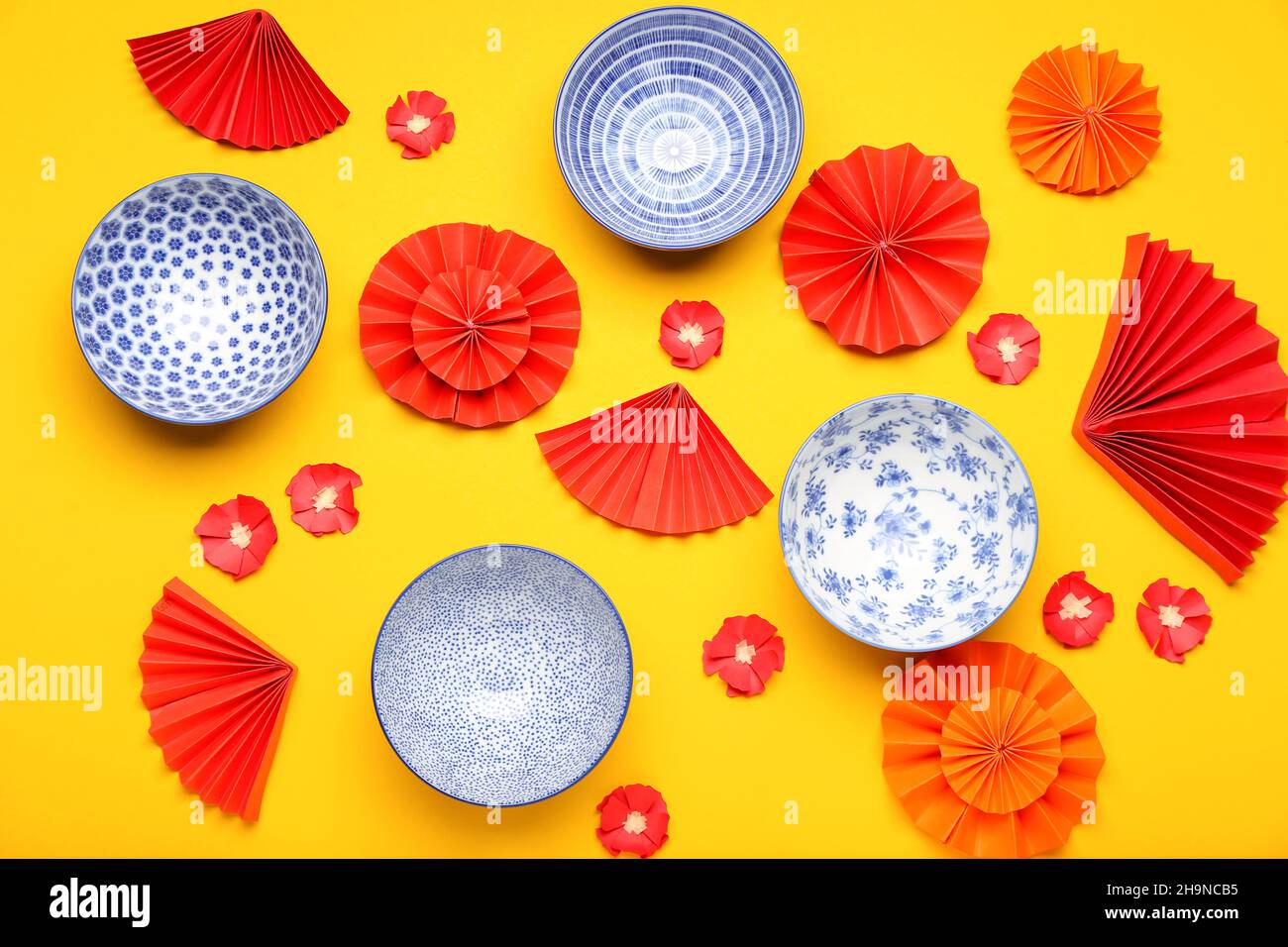 Plates with Chinese symbols on color background Stock Photo - Alamy