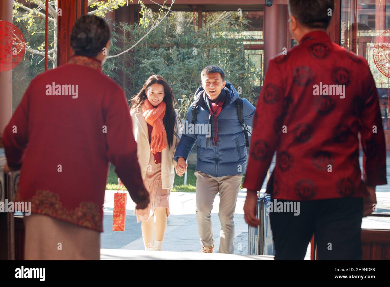 Young couples home to reunite with their parents Stock Photo - Alamy