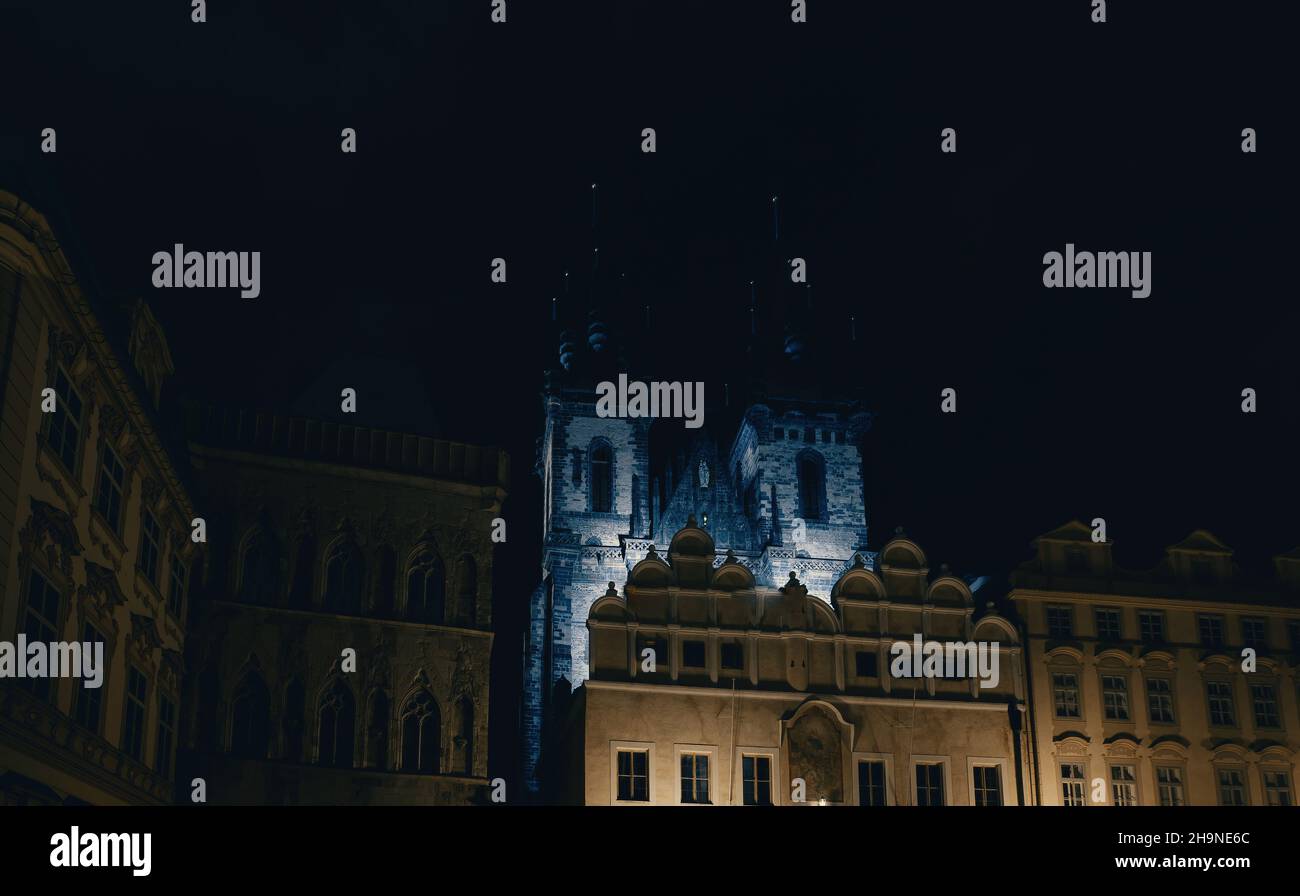 view of a dark and illuminated cobblestone street in the old town of prague at night 2021 Stock ...