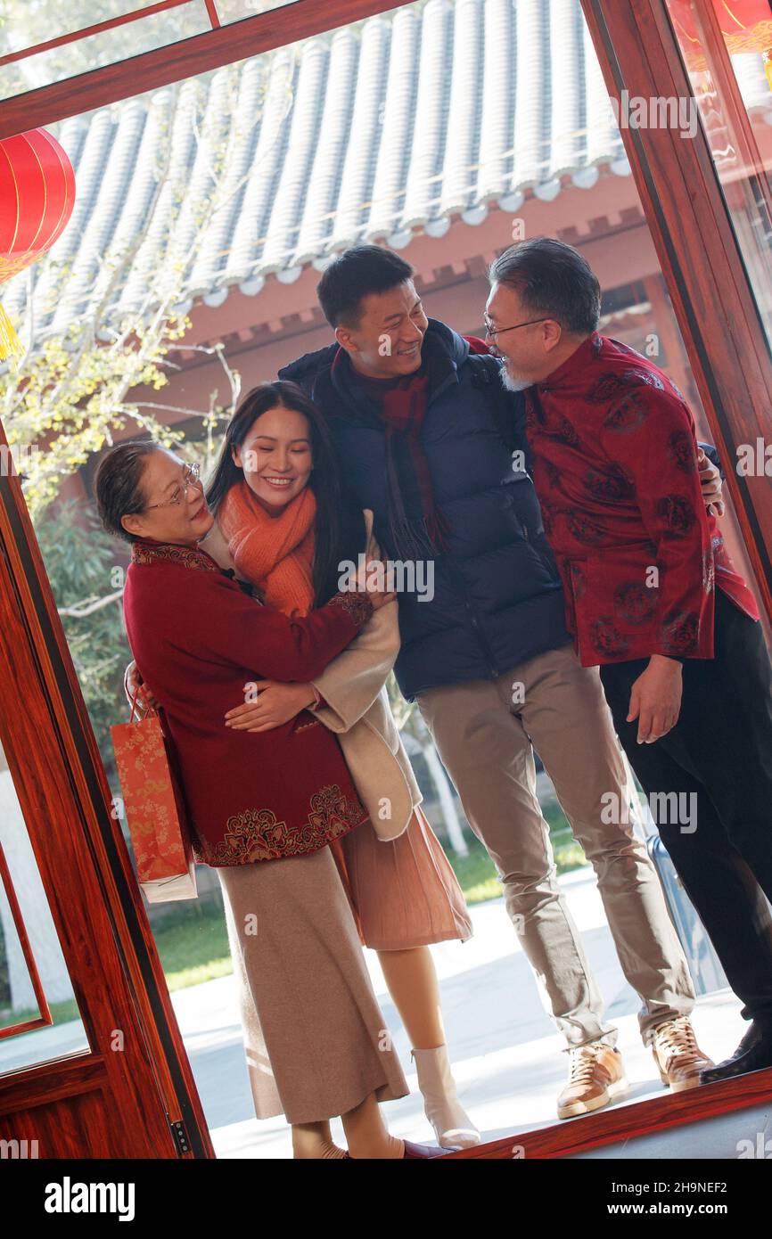 Young couples home to reunite with their parents Stock Photo - Alamy