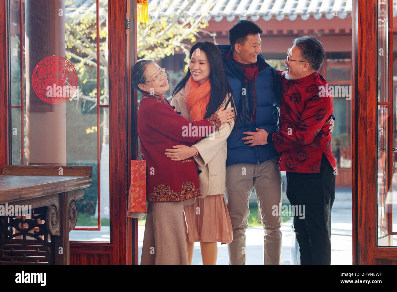 Young couples home to reunite with their parents Stock Photo - Alamy