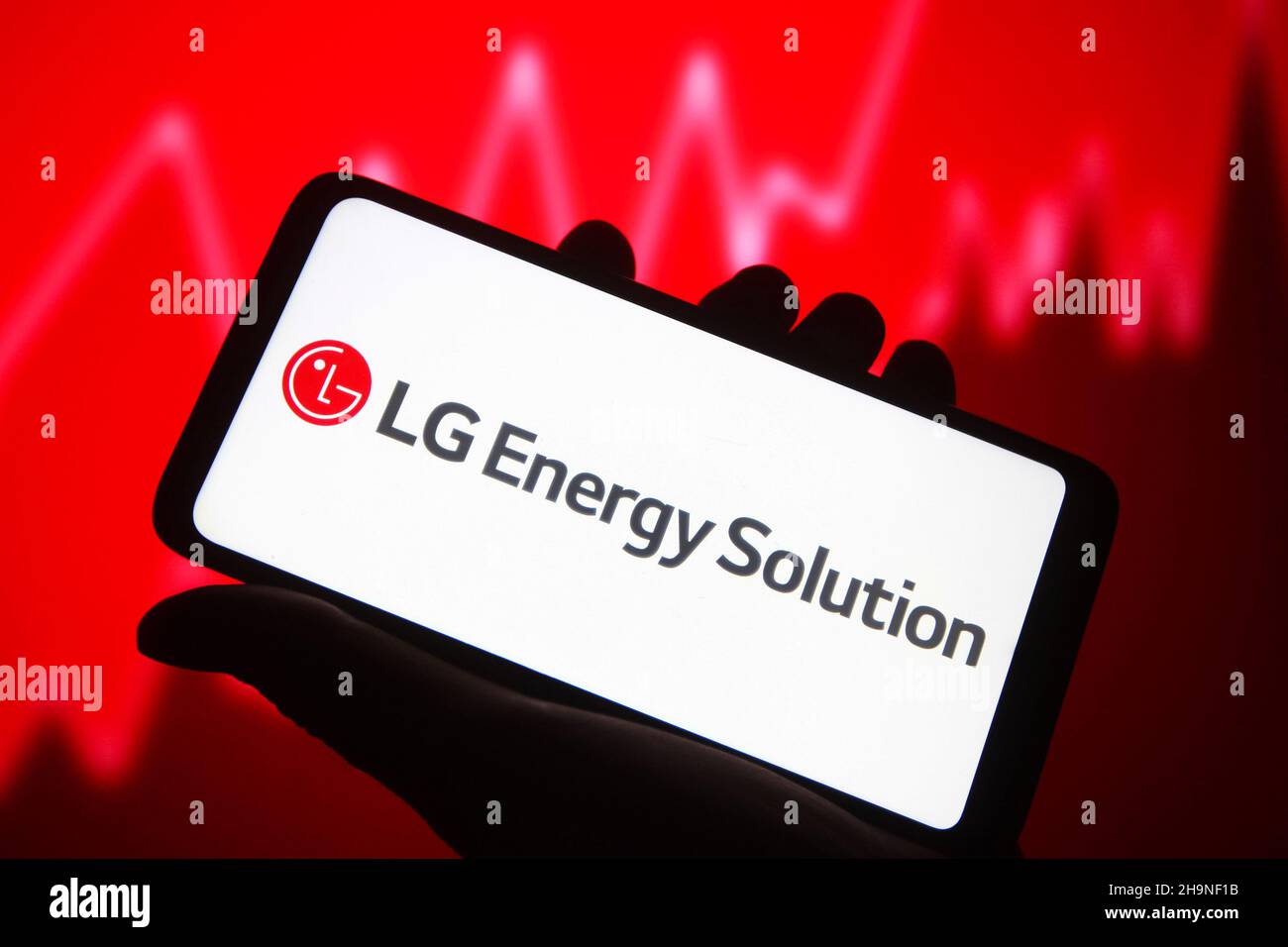 In this photo illustration, a LG Energy Solution logo is seen on a ...
