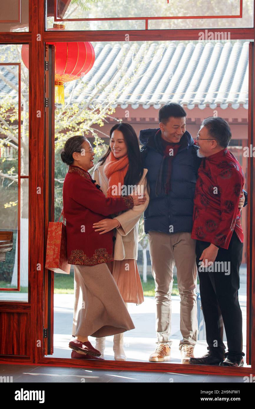 Young couples home to reunite with their parents Stock Photo - Alamy