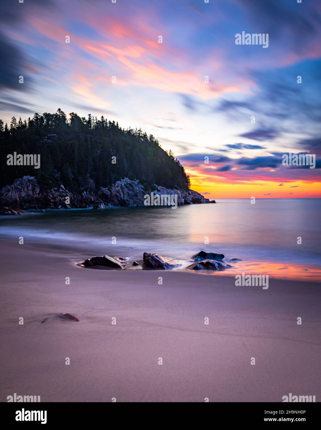 Sunrise over an ocean beach in Canada Stock Photo - Alamy