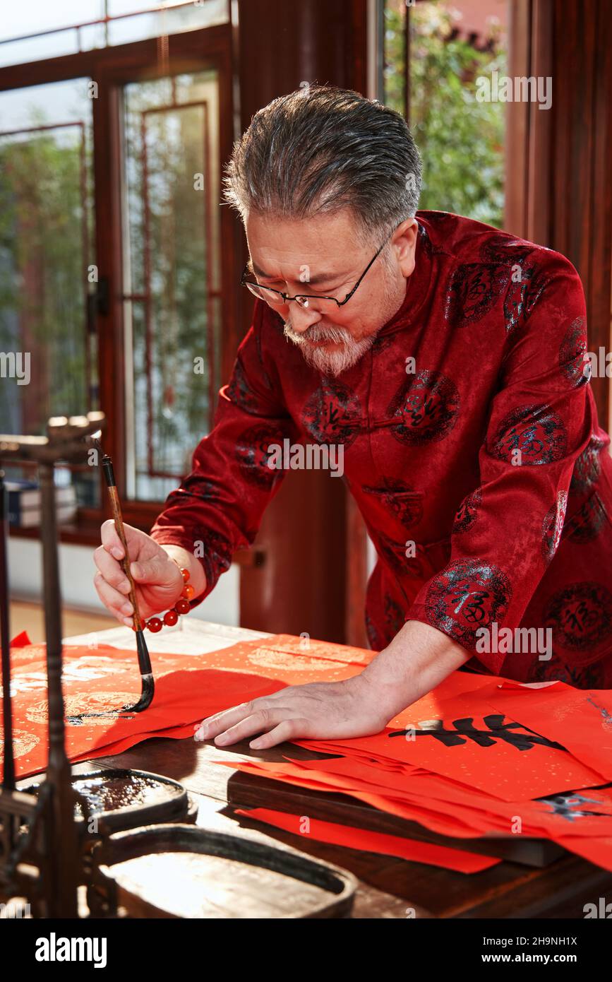 Older men write calligraphy Stock Photo - Alamy Older men write calligraphy Stock Photo - Alamy
