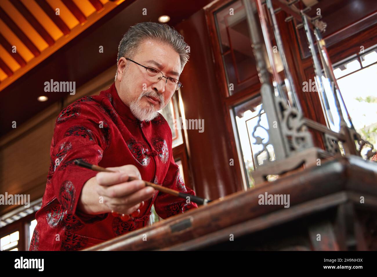 Older men write calligraphy Stock Photo - Alamy Older men write calligraphy Stock Photo - Alamy