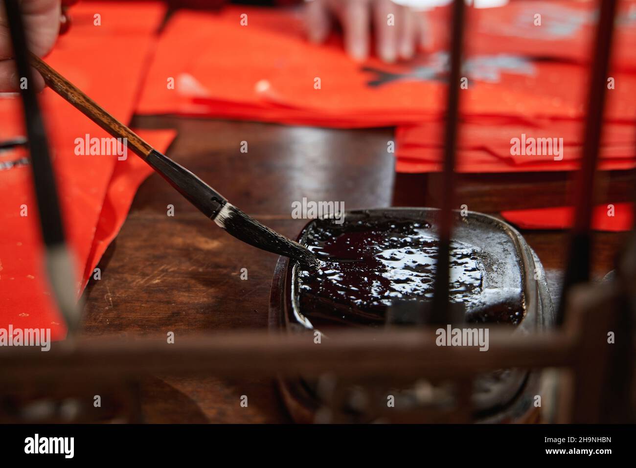 Brush ink stone Stock Photo - Alamy