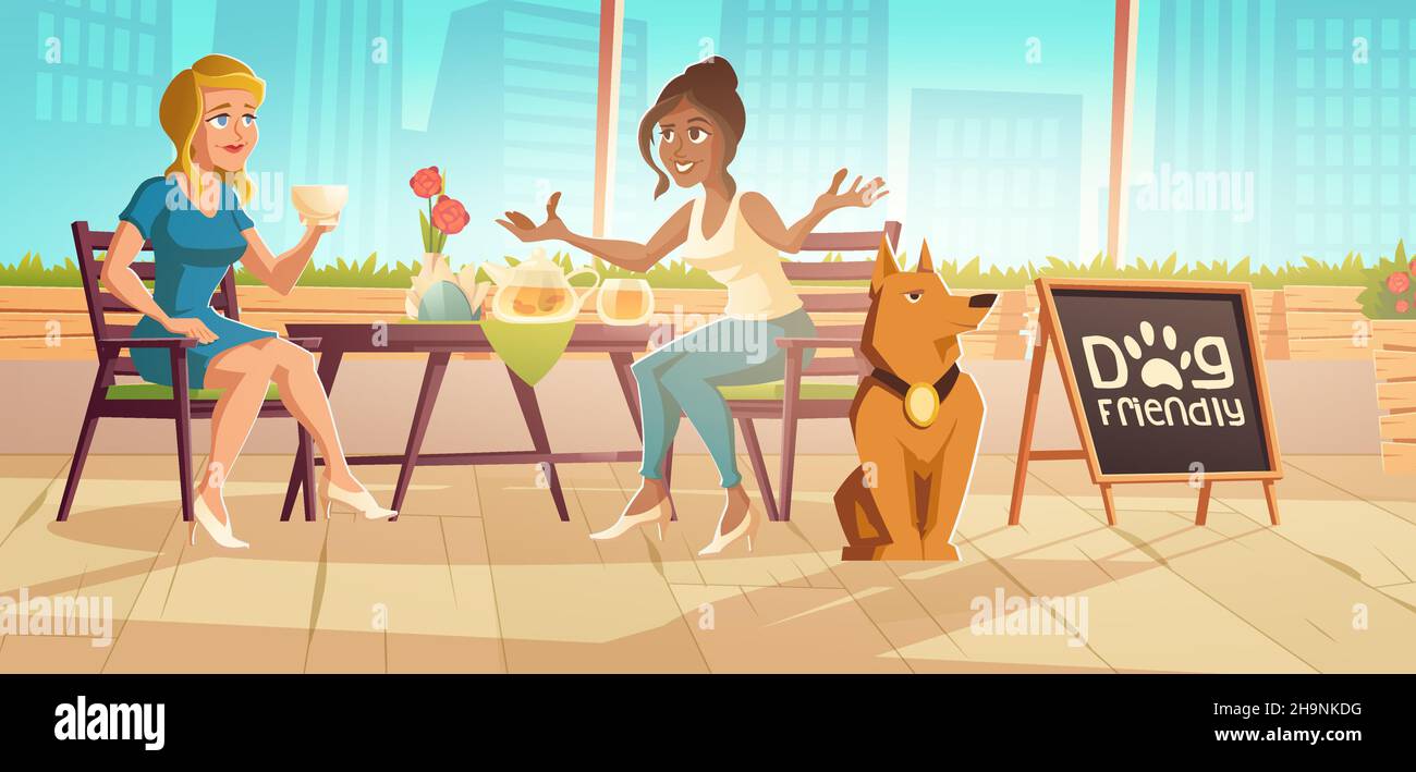 Women with pet meeting in dog friendly cafe. Girl friends communicate ...