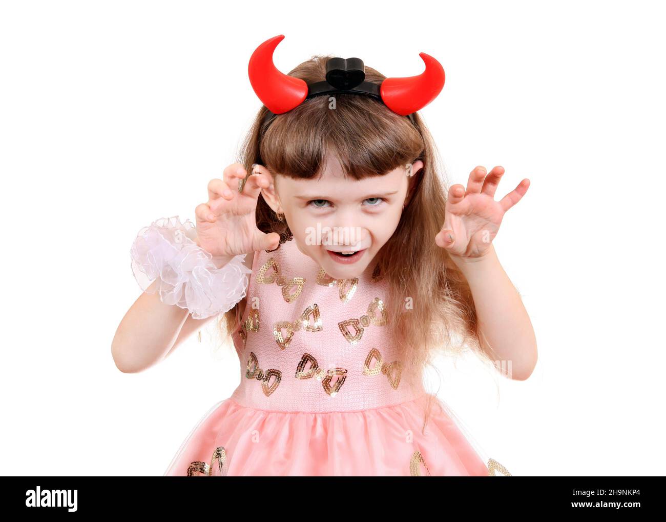 Little Girl with Devil Horns on the White Background Stock Photo - Alamy