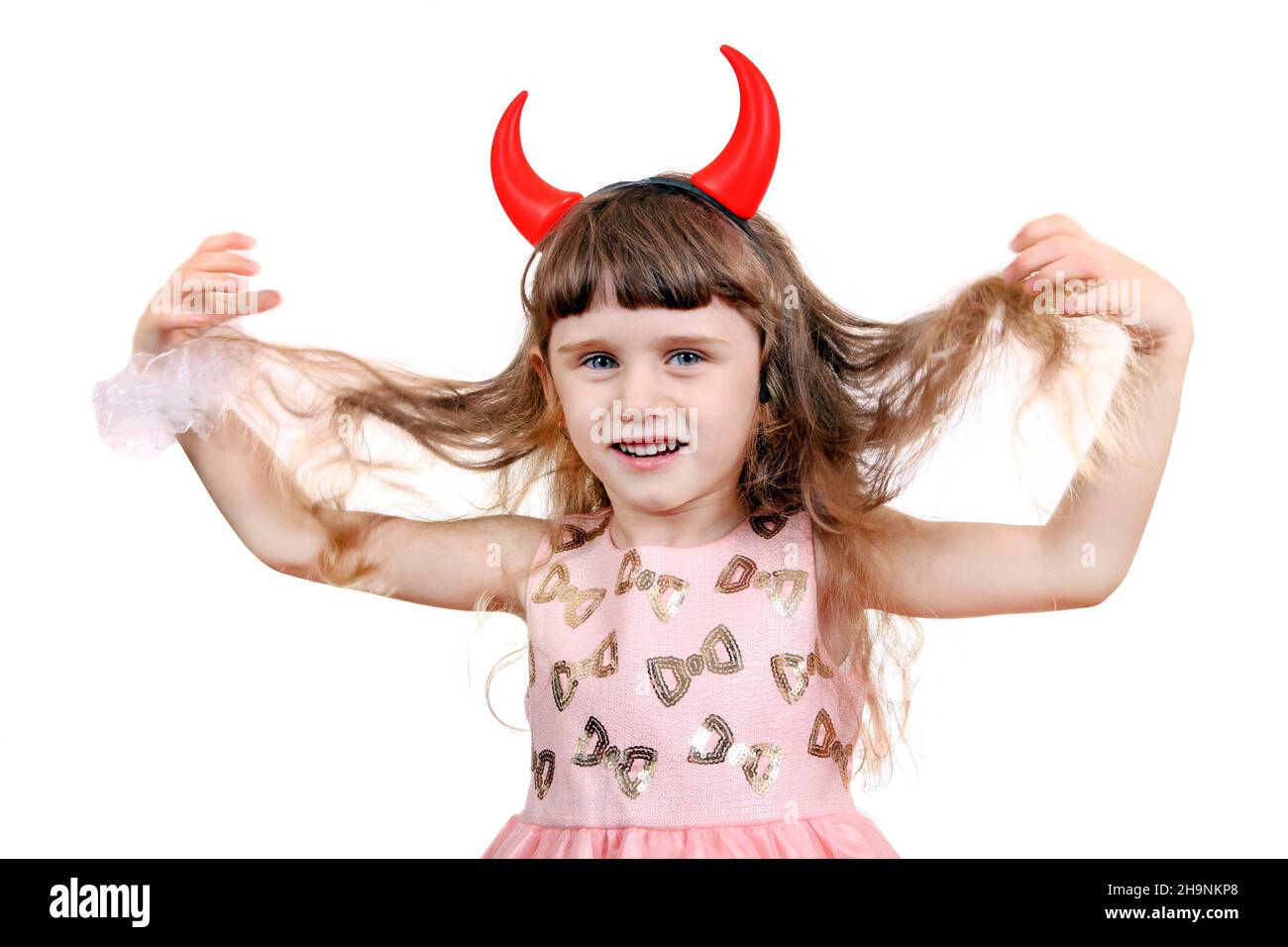 Cheerful Little Girl with Devil Horns on the White Background Stock ...
