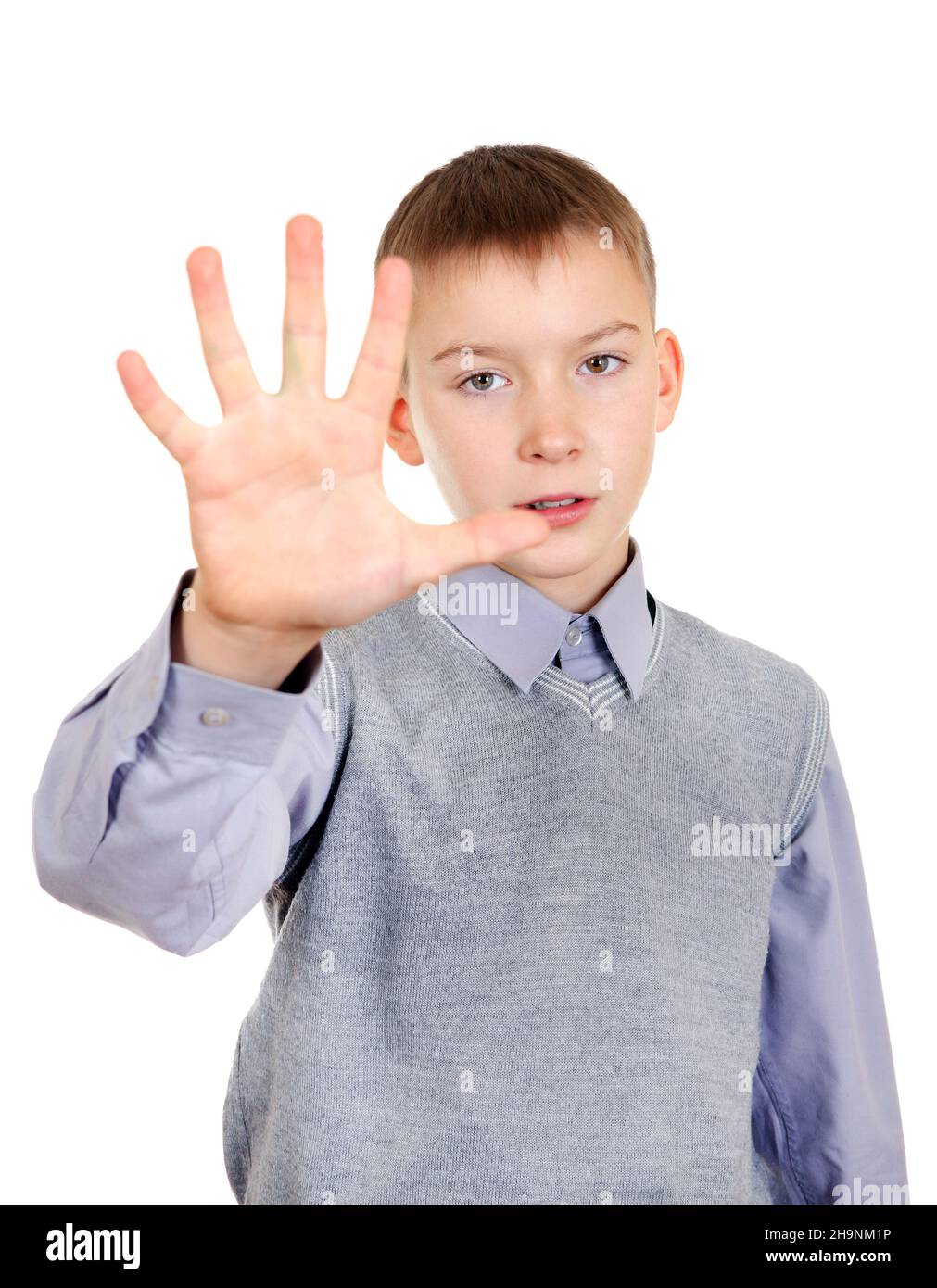 Serious Kid show Stop hand gesture Isolated on the White Background ...