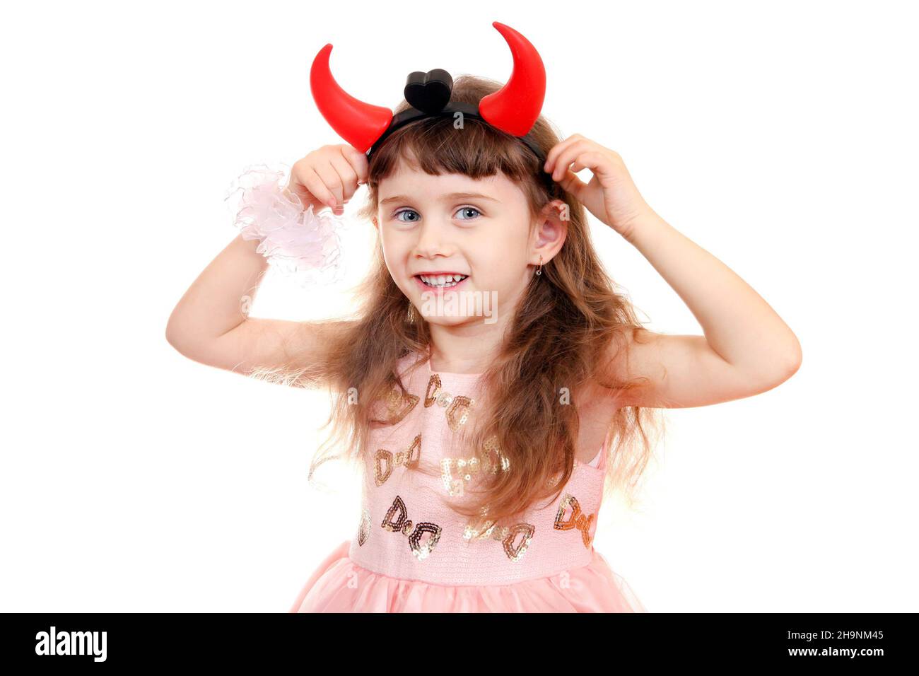 Cheerful Little Girl with Devil Horns on the White Background Stock ...
