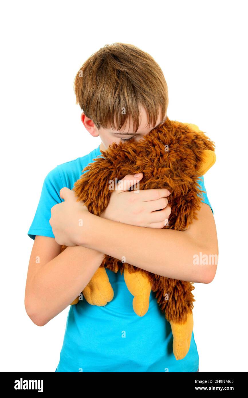Sad Kid with Plush Toy on the White Background Stock Photo - Alamy