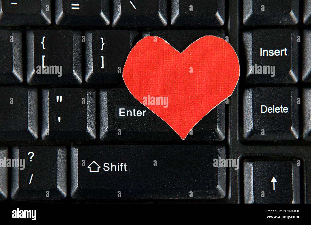 Red Heart Shape on the Computer Keyboard closeup Stock Photo - Alamy