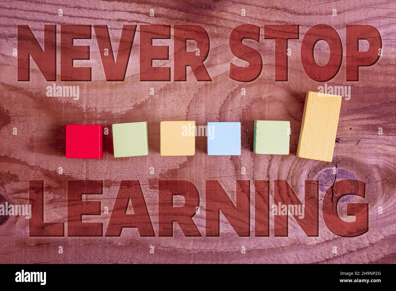 Hand writing sign Never Stop Learning. Business showcase keep on ...