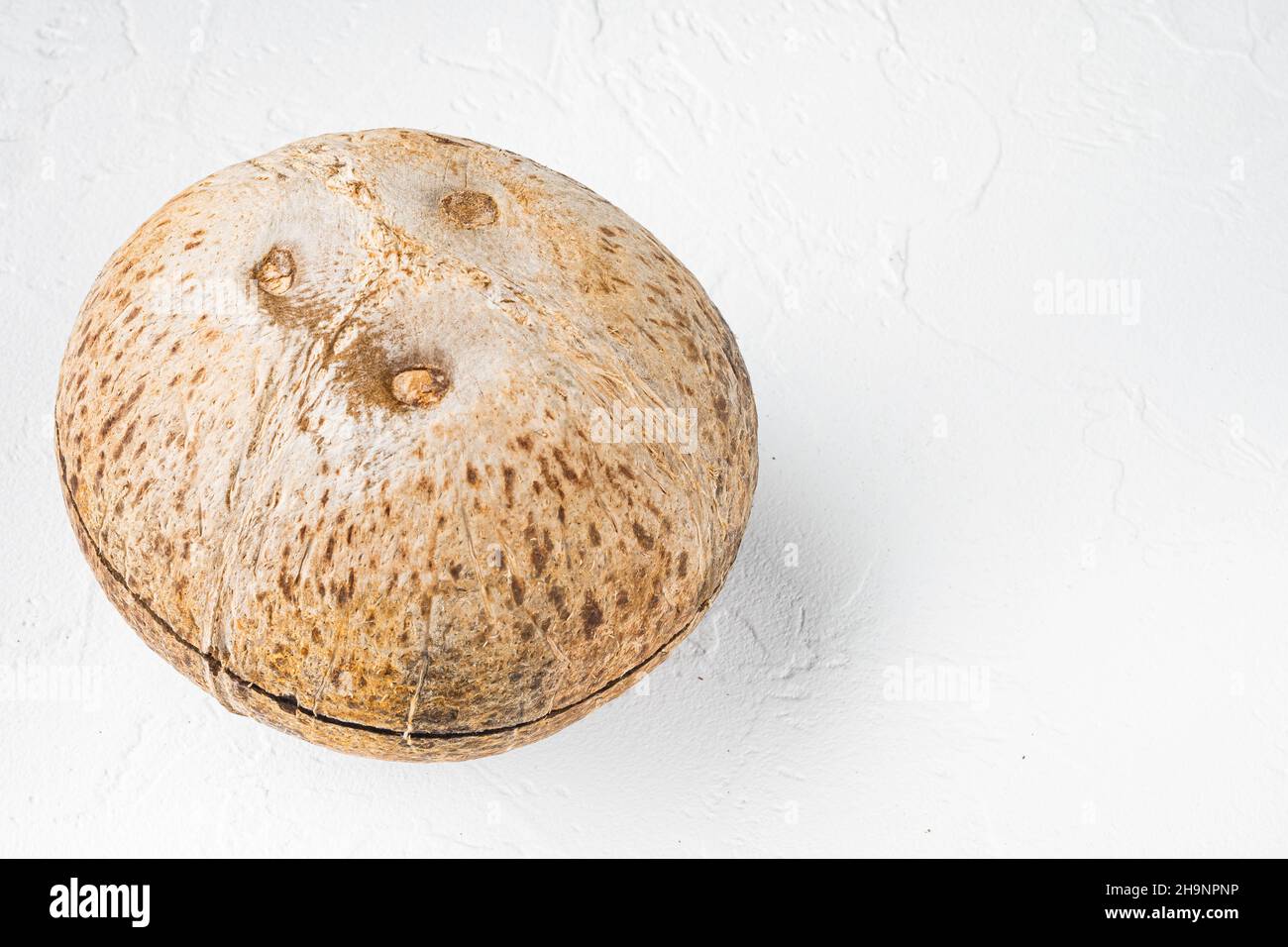 Tropical fruit coconut whole set, on white stone table background, with ...