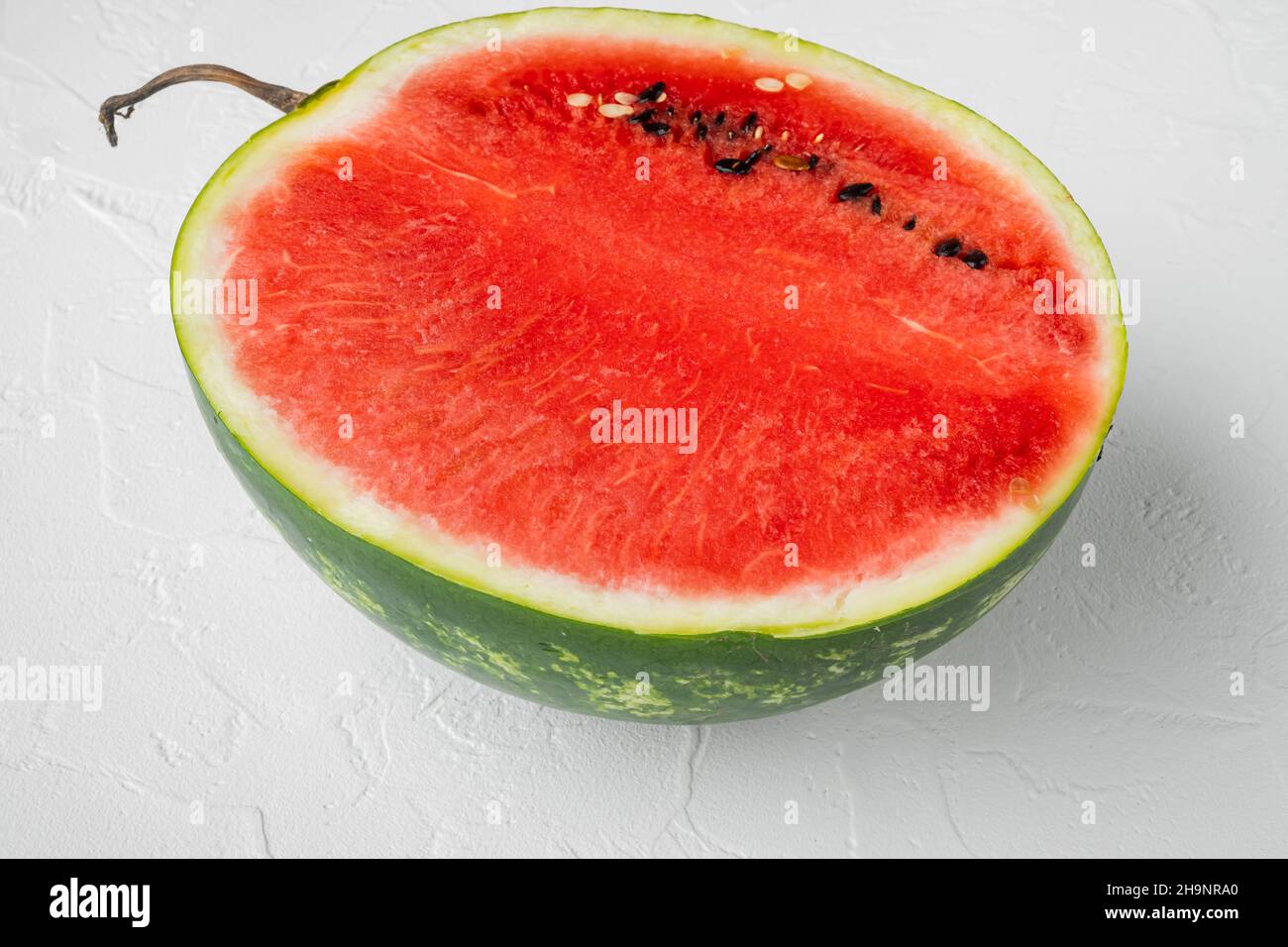 Watermelon cut set, on white stone table background Stock Photo - Alamy