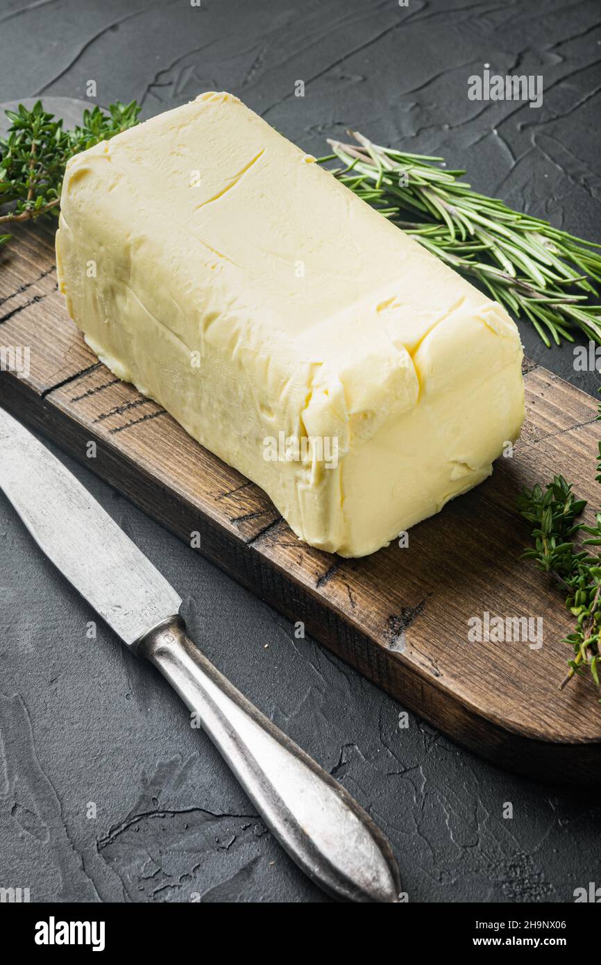 Dairy fresh butter, on black background Stock Photo - Alamy