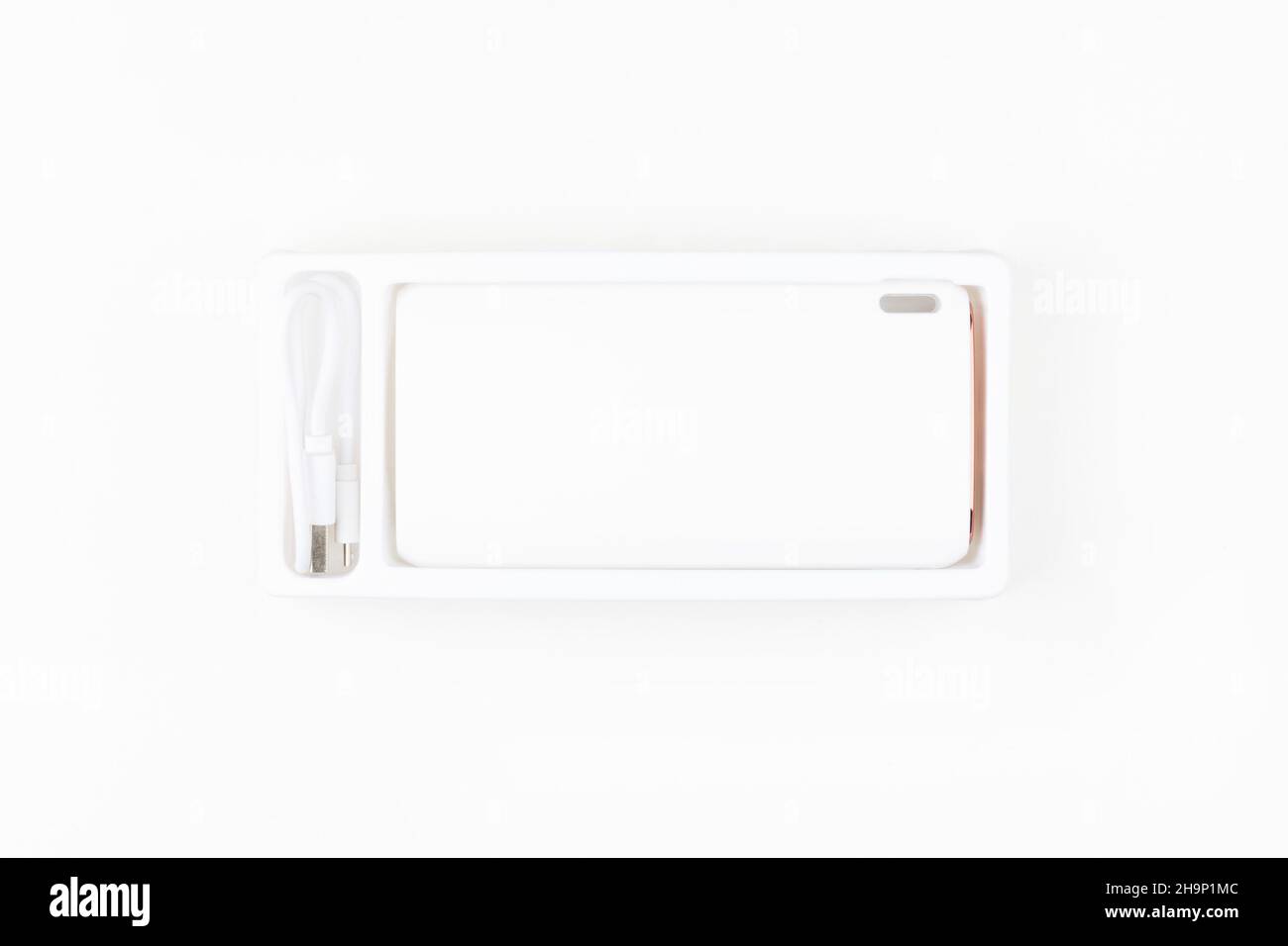 white power bank for charging smartphones and various digital devices ...