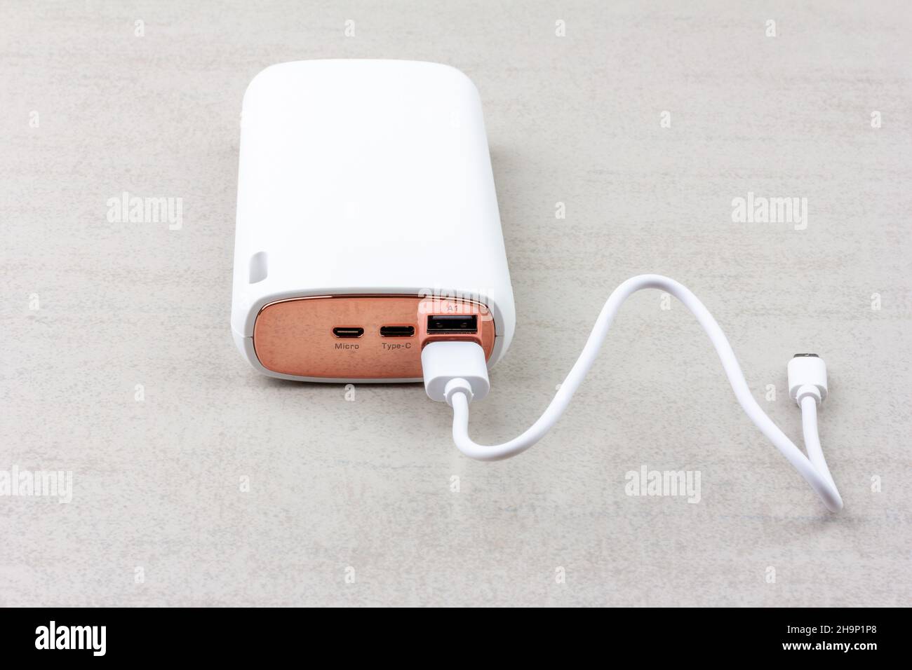 white power bank for charging smartphones and various digital devices ...