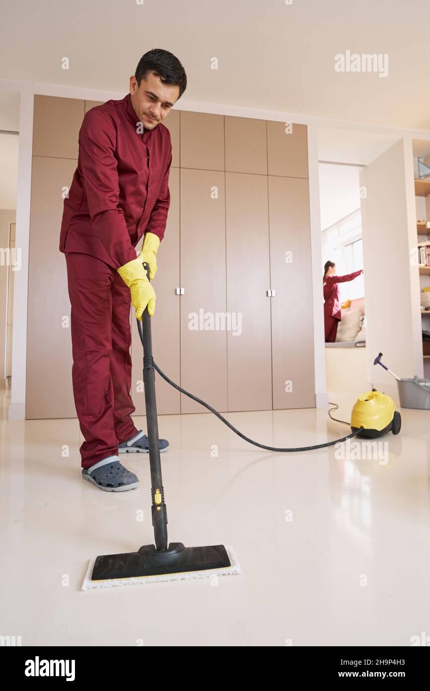 Lady janitor hi-res stock photography and images - Alamy