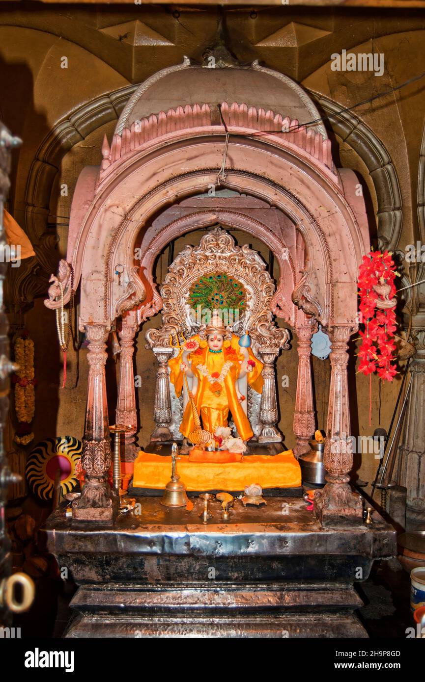 Hindu God Dattatrya in decorative wooden frame Devhara Stock Photo - Alamy