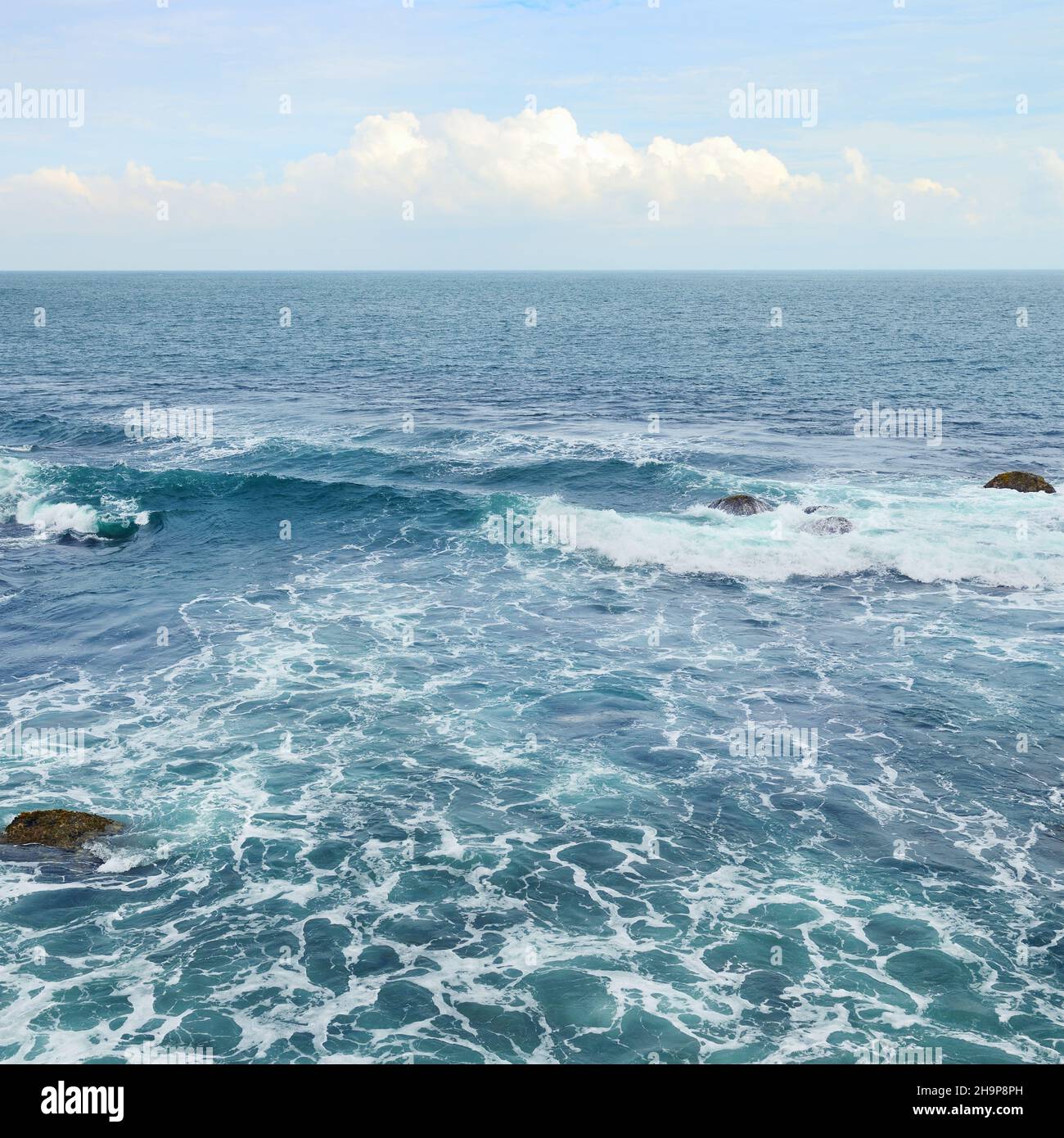 Beautiful ocean waves and blue sky Stock Photo - Alamy