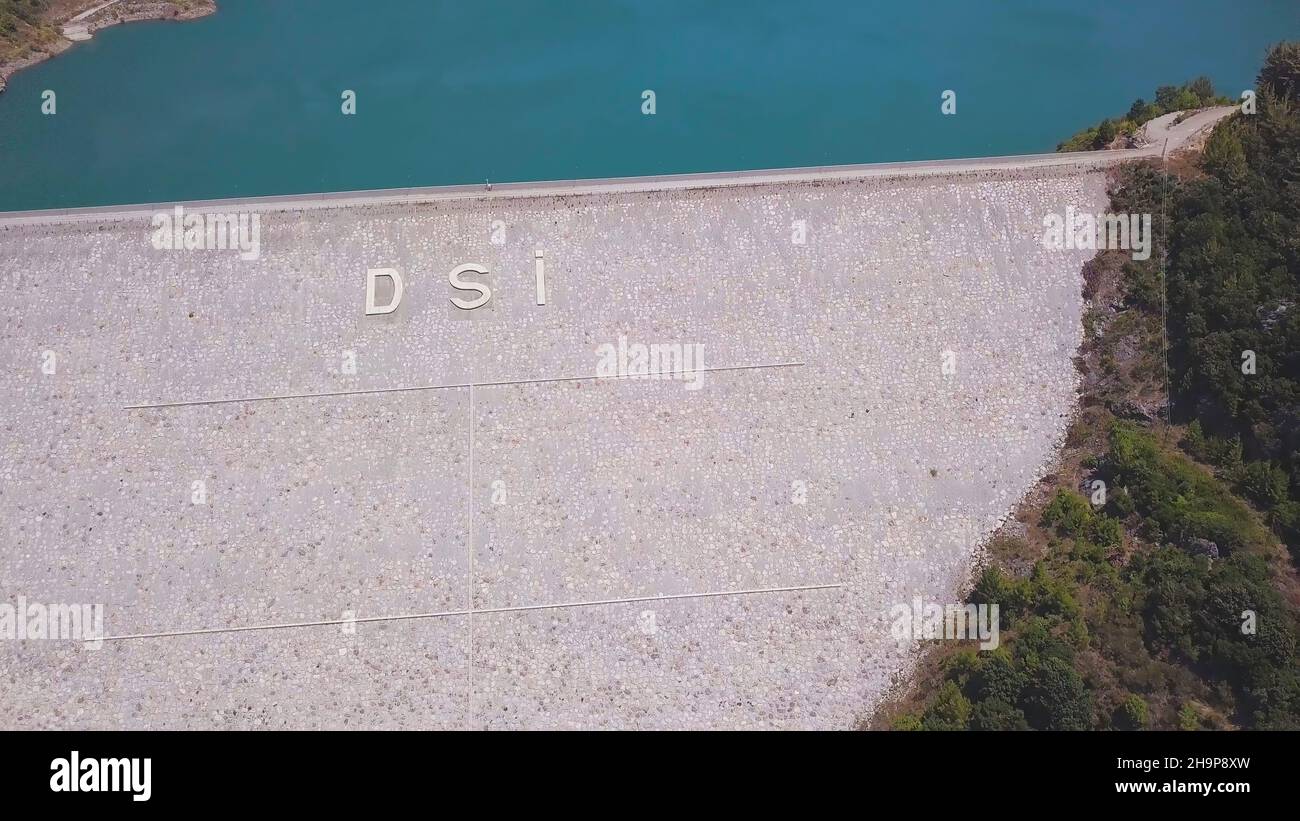 Alanya Dim dam. Clip. Top view of large dam holding back water in ...