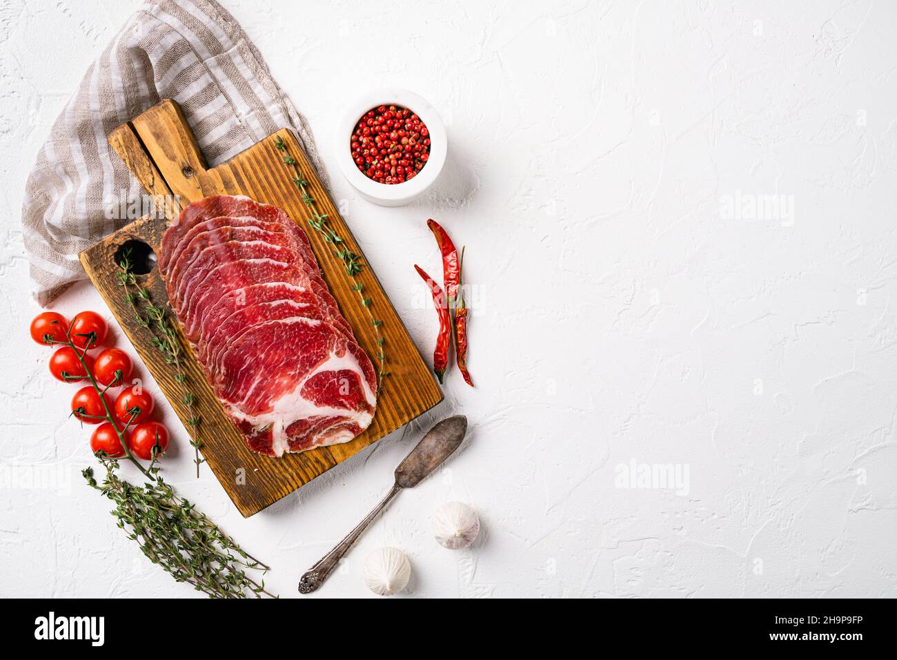 Coppa pork collar ham set, on white stone table background, top view ...