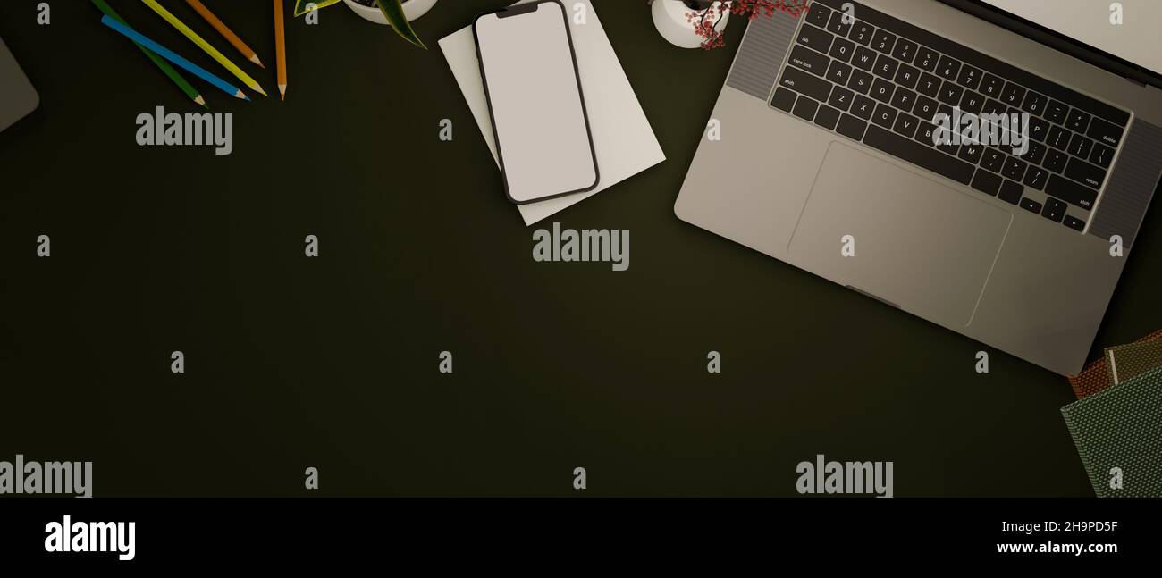 Top view of a modern desk with laptop computer, smartphone, stationery ...