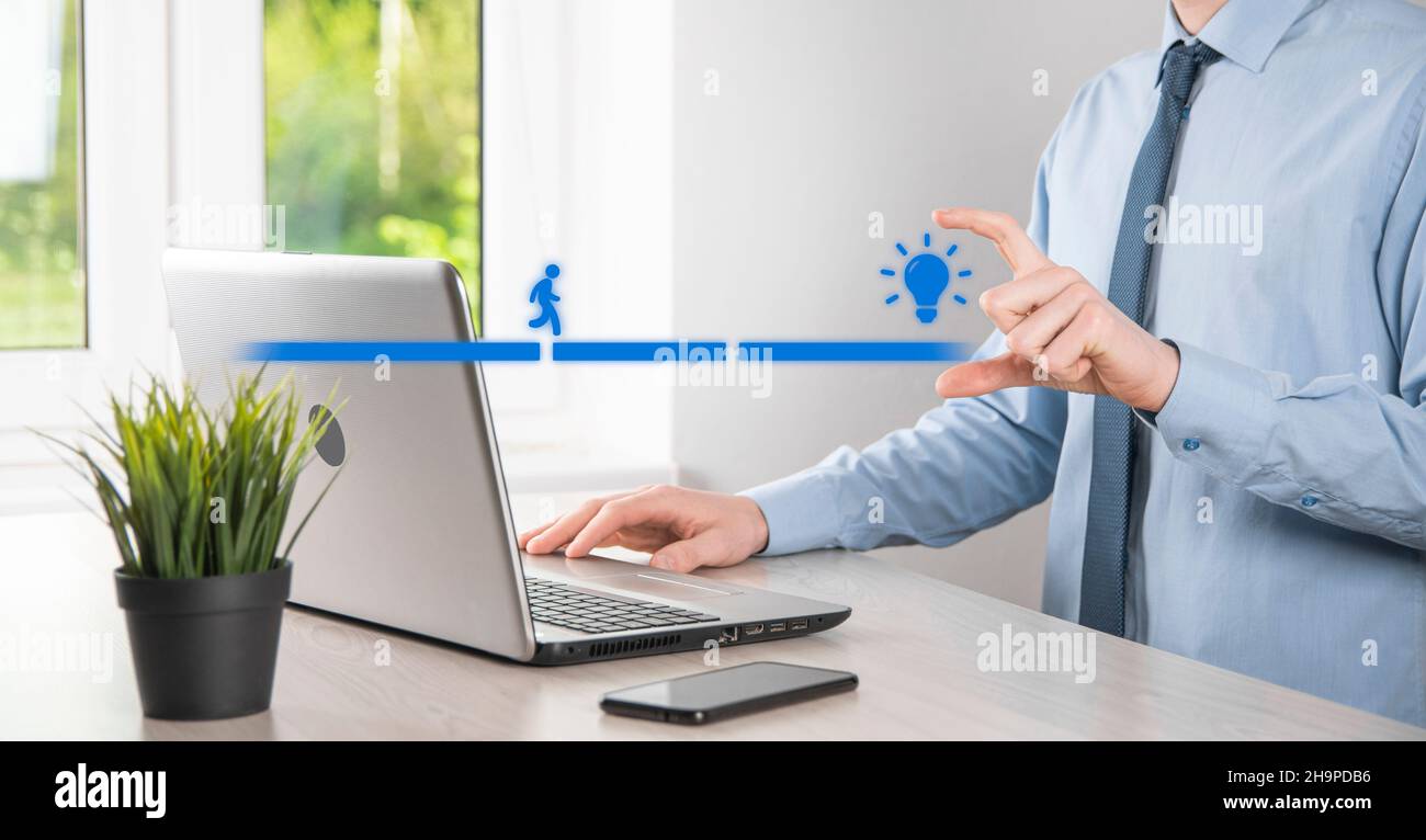 Male business man hand hold a connecting block between two sets of ...
