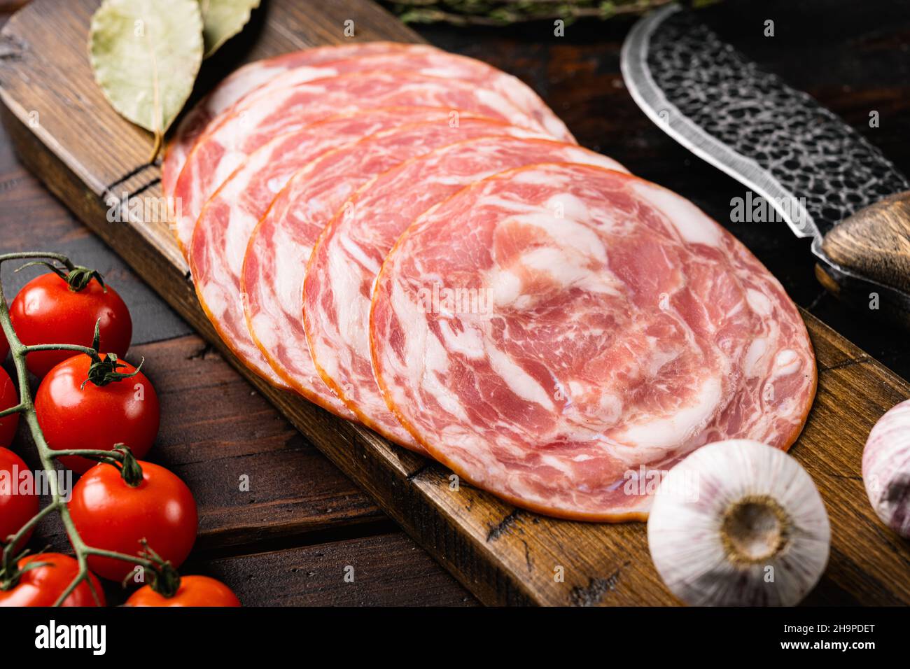 Sliced smoked sausage set, on old dark wooden table background Stock ...