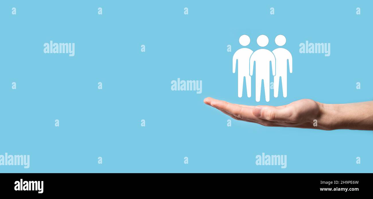 Businessman hold teamwork icon. Building a strong team. people icon ...