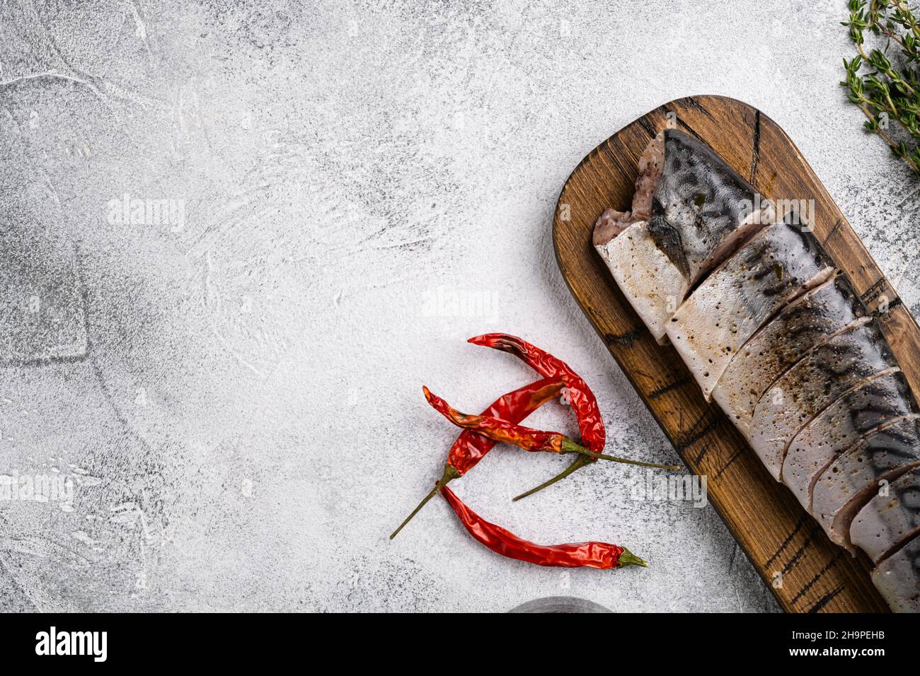 Marinated mackerel whole fish set, on gray stone table background, top ...