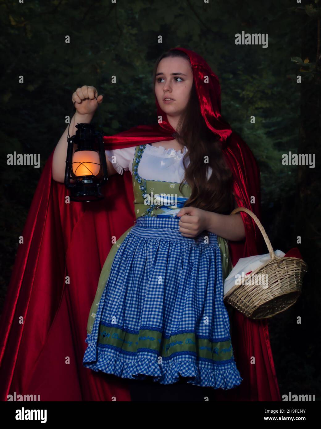 Little Red Riding Hood with a startled look on her face in the Black ...