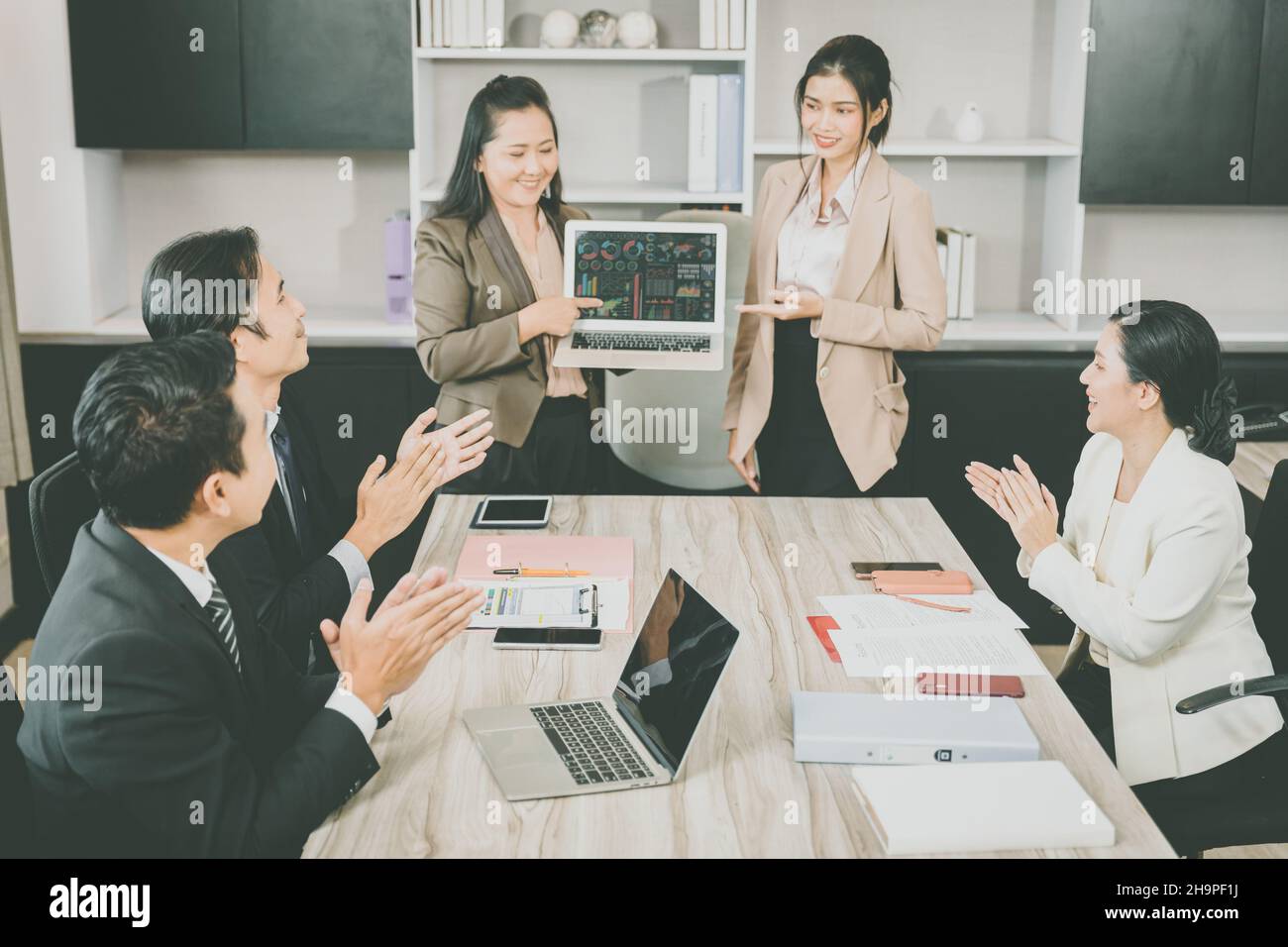 Business Working Women Presentation in Meeting room with people glad ...