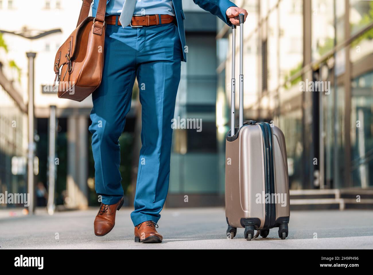 Young businessman with suitcase travelling.Businessman with luggage in ...