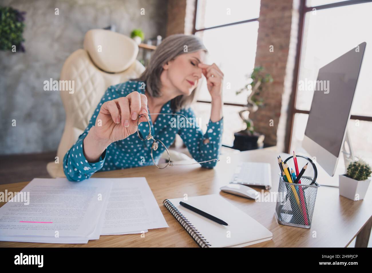 Profile side photo of aged business woman unhappy sad upset tired sit ...