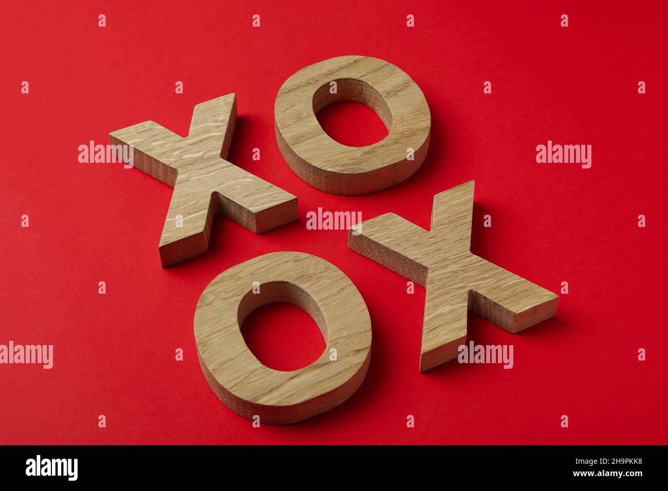 Valentine's Day concept with XO letters on red background Stock Photo ...