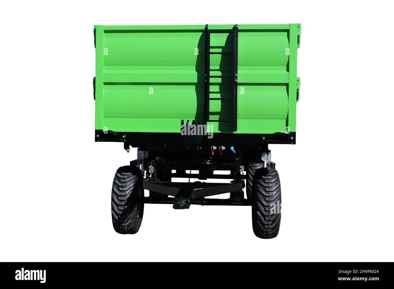 Green tractor trailer on a white background Stock Photo - Alamy