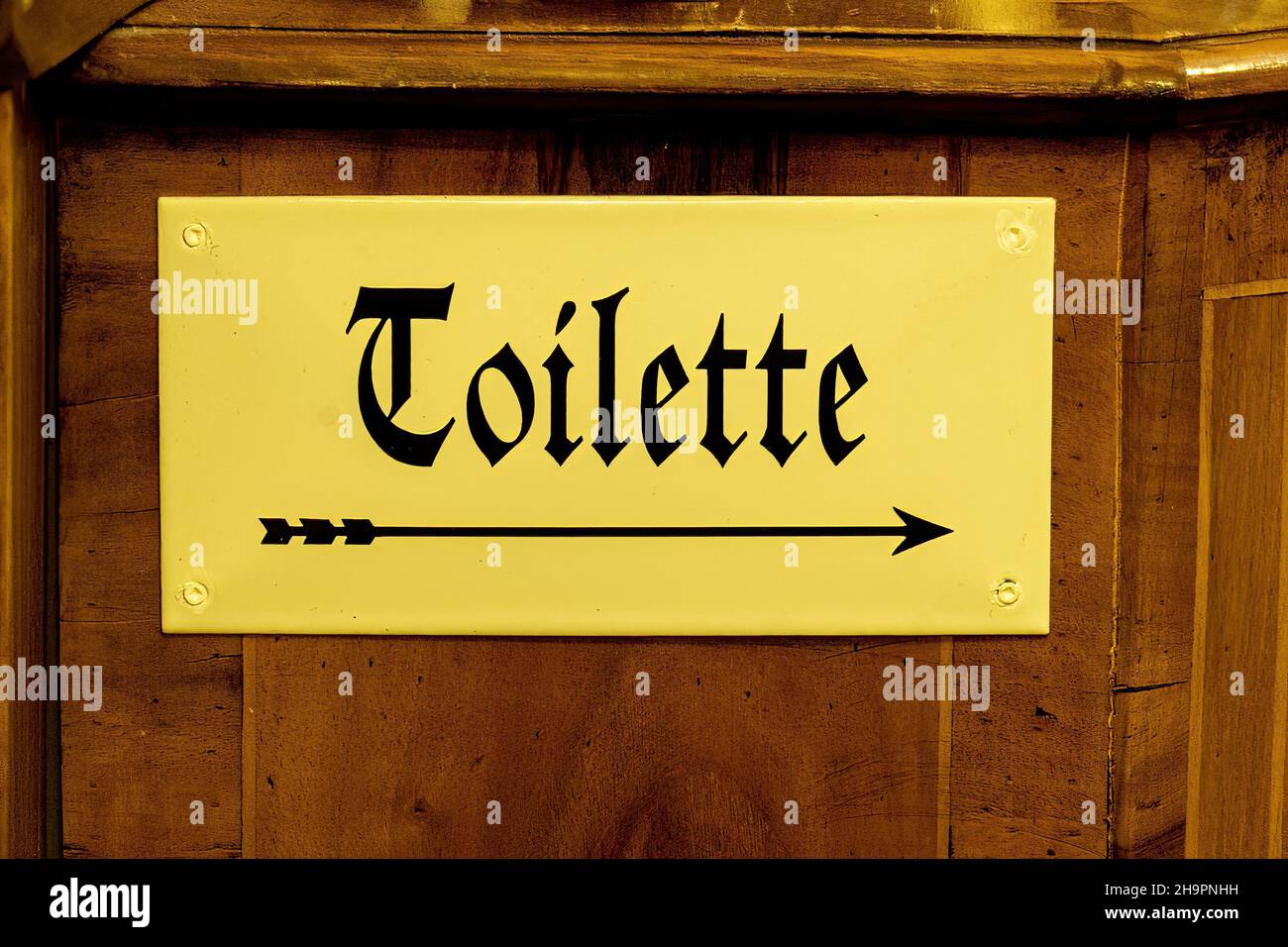 Toilette wc arrow sign on copper old style german vintage writing Stock ...