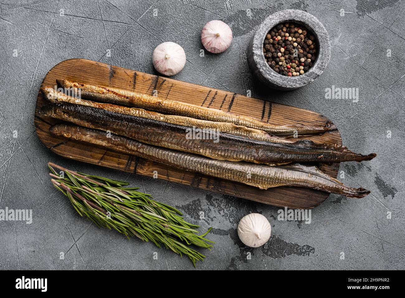 Fried river lamprey set, on gray stone table background, top view flat ...