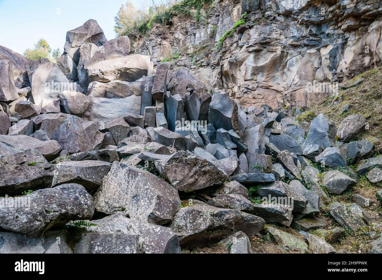 vertical lava columns, old lava flow, basalt column, hexagonal shape ...